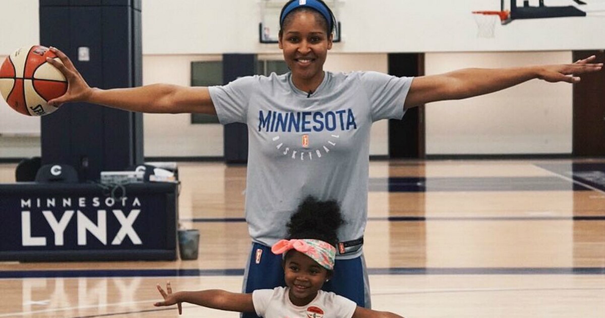 Maya Moore Meets 4-year-old Fan Who Posed in Front of Her Billboard.